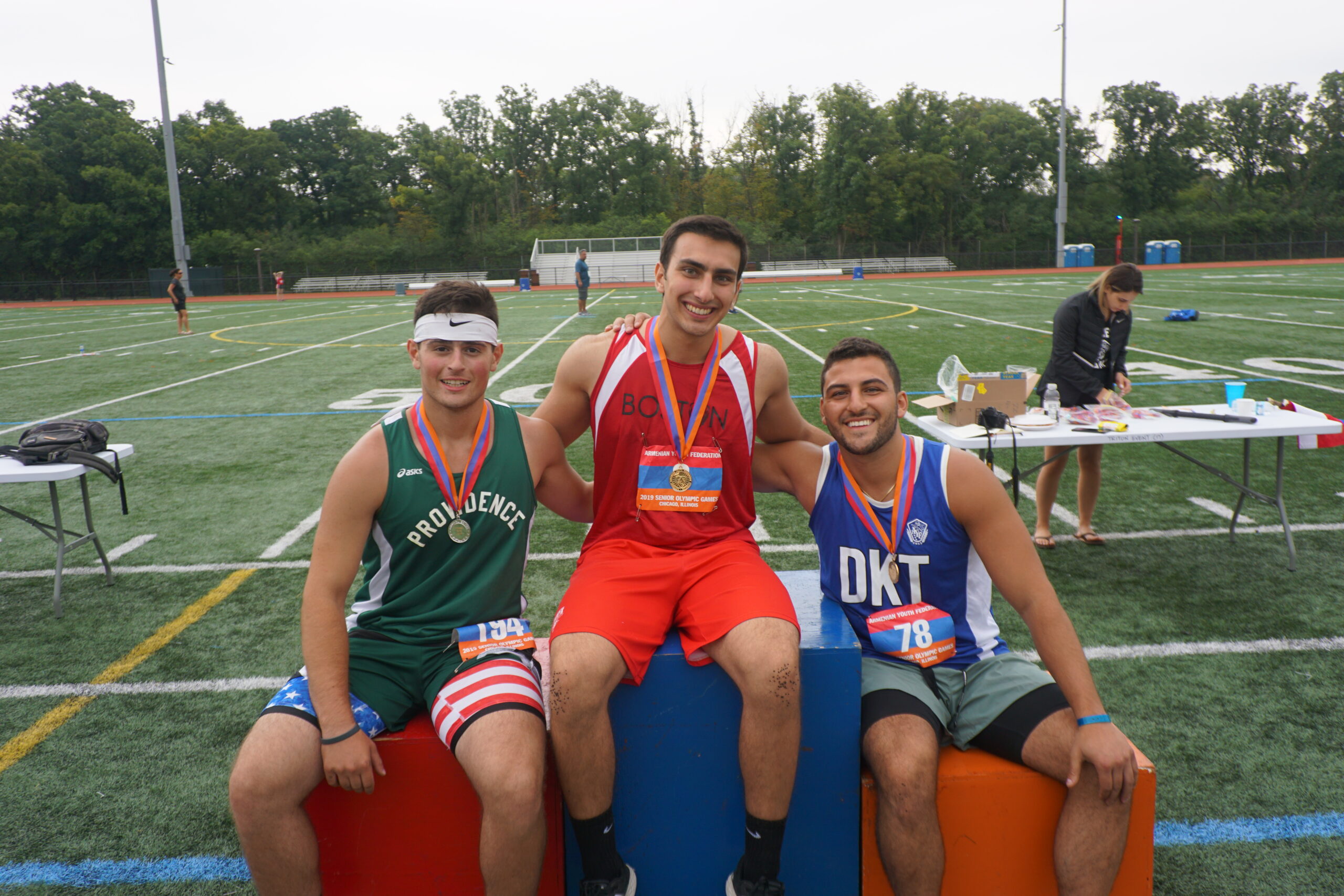 Shot Put Medalists (L-R) Zachary Semerjian (PROV), Alex Avakian (GBOS ...
