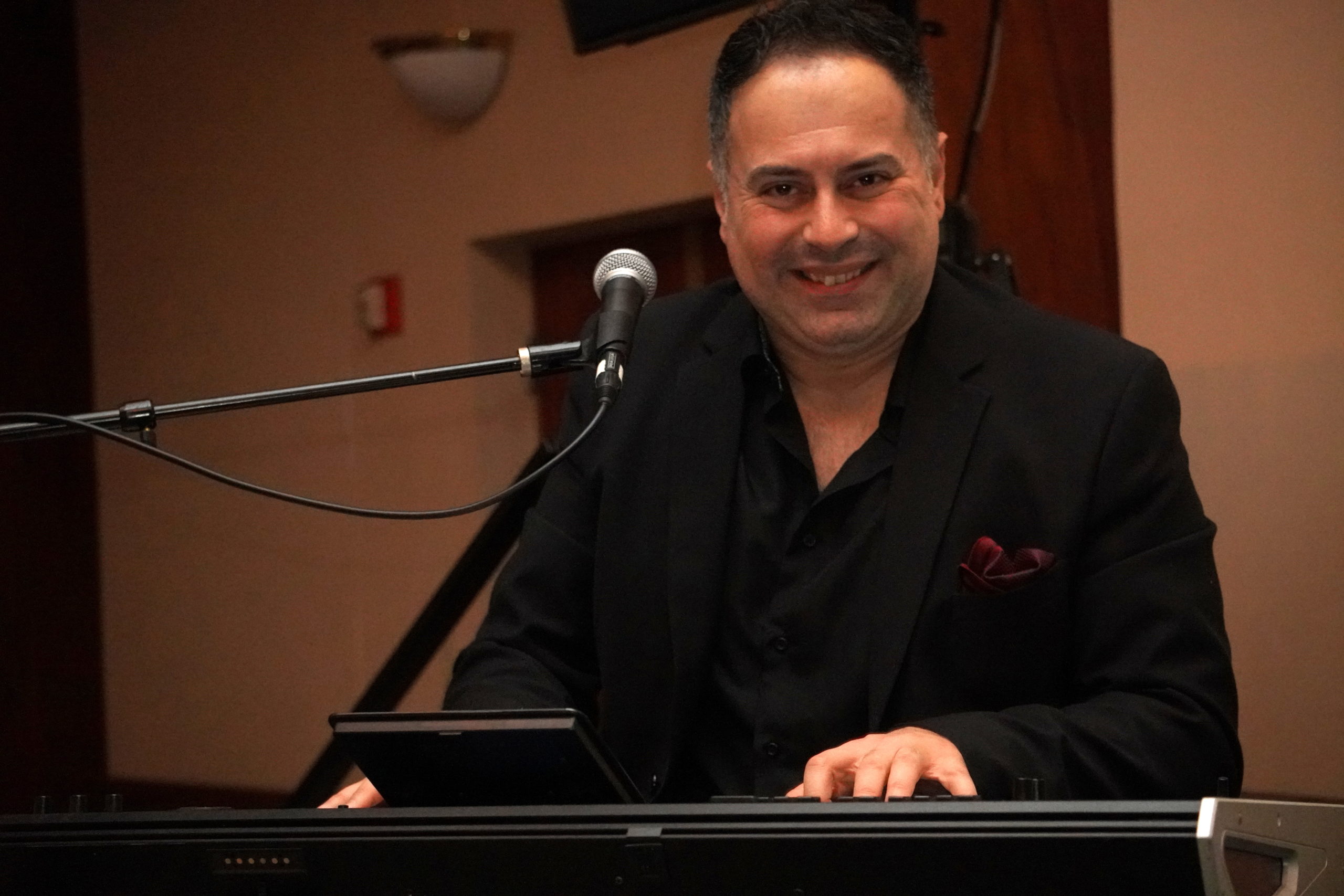 George Tebrejian on keyboard (Photo GVK Images) - The Armenian Weekly