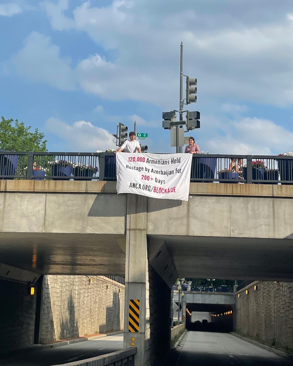 On day 5 of the protest, chapter members hung a banner on overpasses in ...