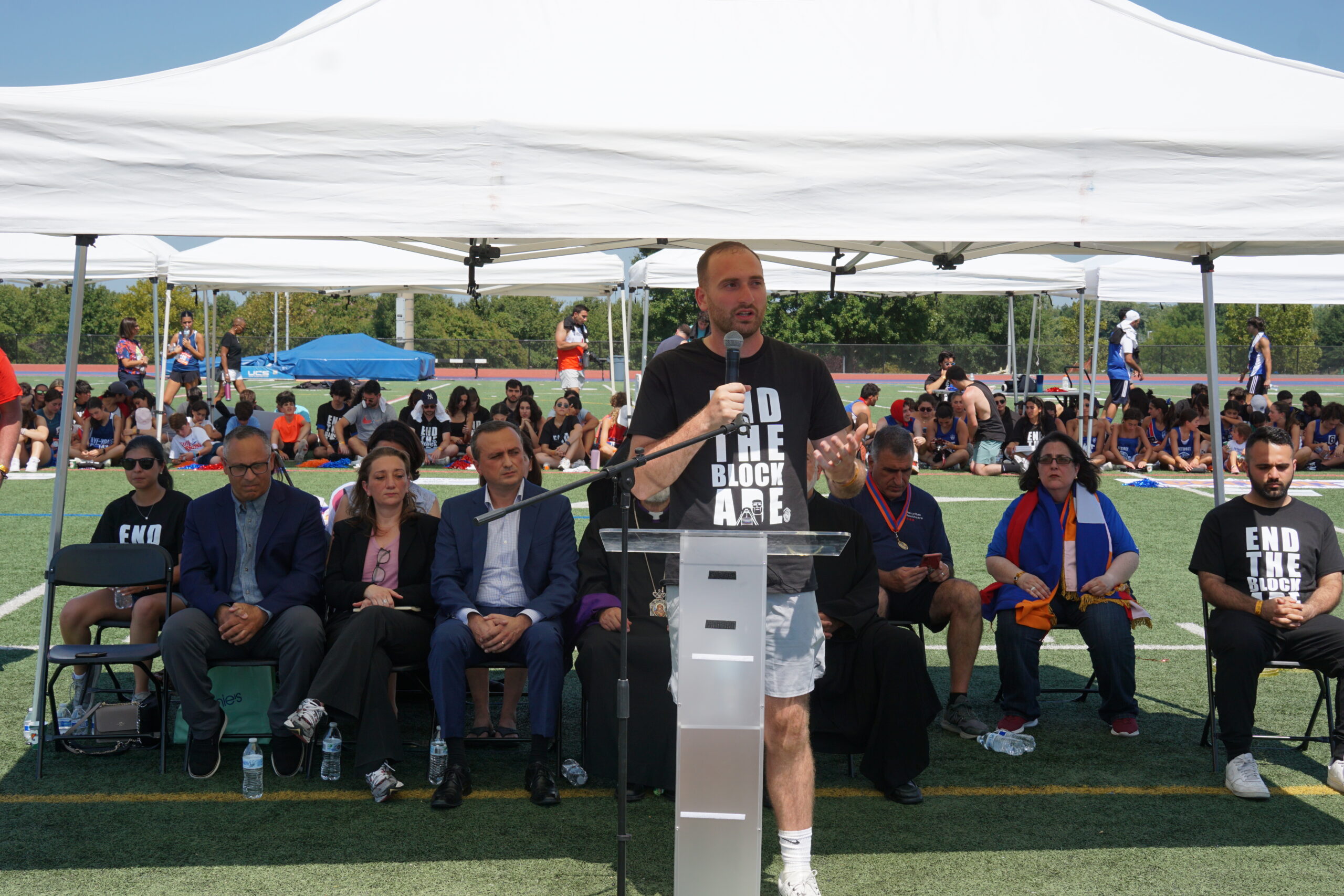 AYF Central Executive chair Nareg Mkrtschjan delivering his remarks as ...