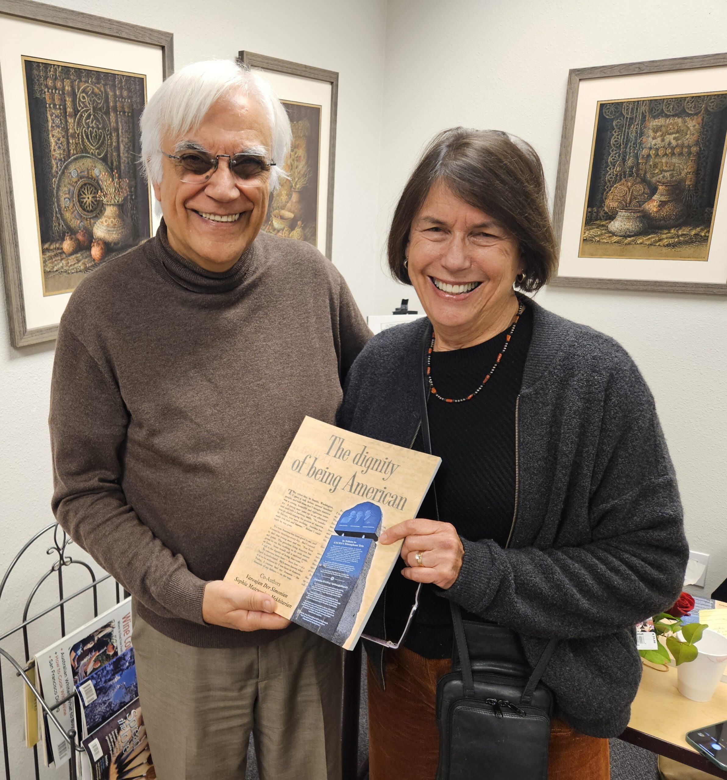 Varoujan Der Simonian presenting a copy of the book The dignity of ...