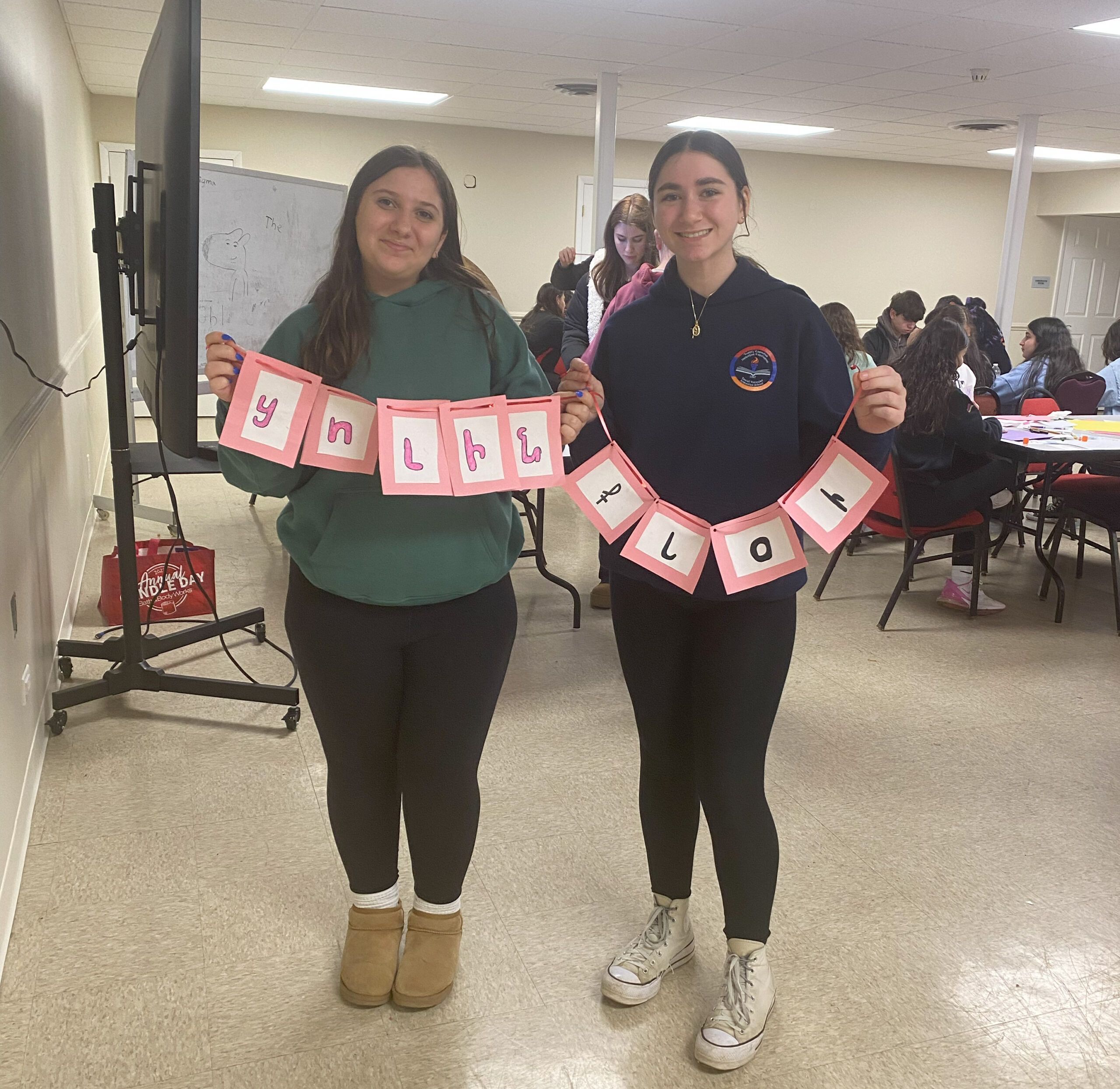 Juniors showing their finished artwork - The Armenian Weekly